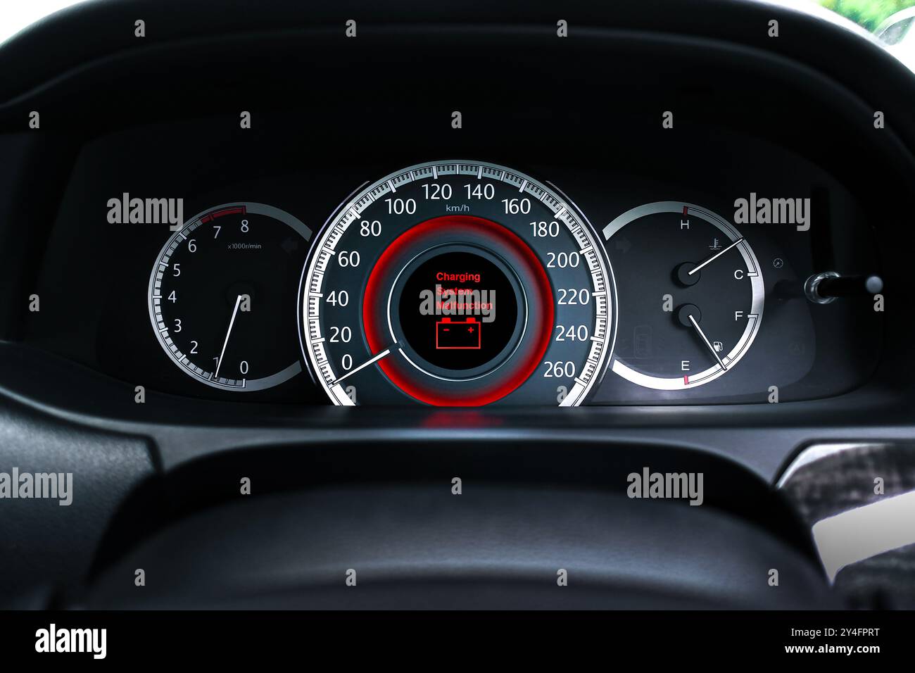 A battery charging system malfunction is displayed on the vehicle ...