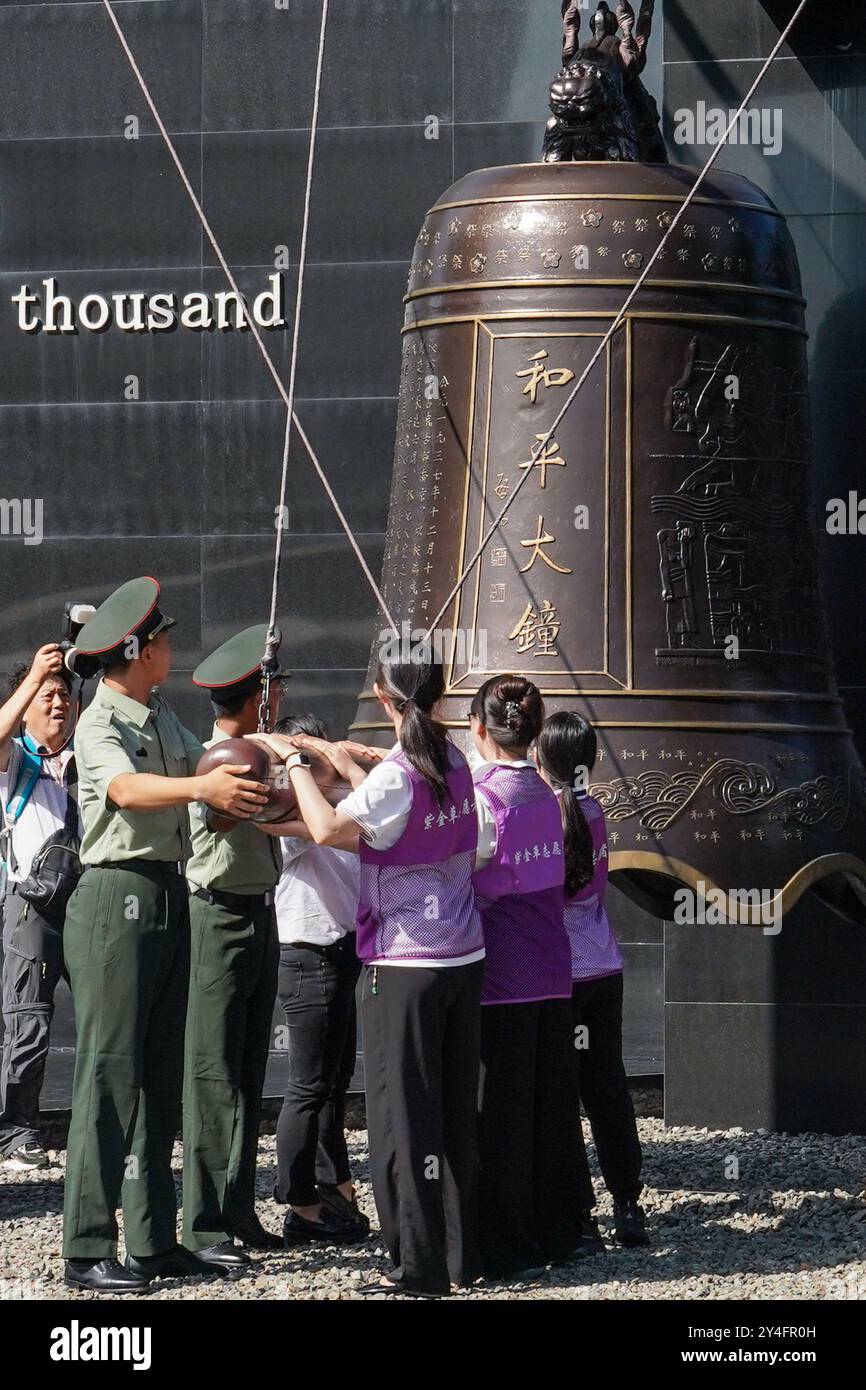 Nanjing, China's Jiangsu Province. 18th Sep, 2024. People strike the ...