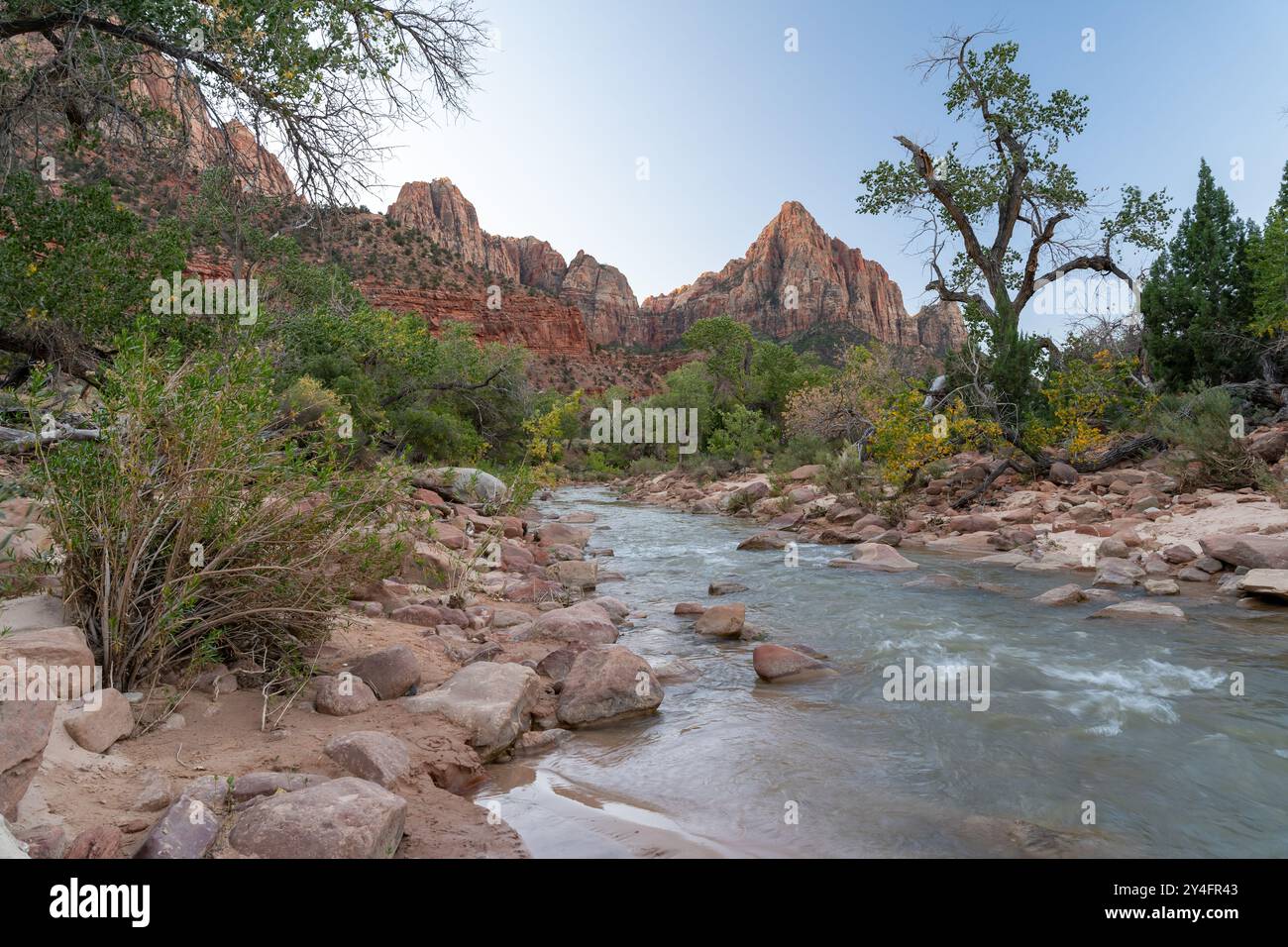 A beautiful view of the Virgin river and red rocks down in the Zion ...