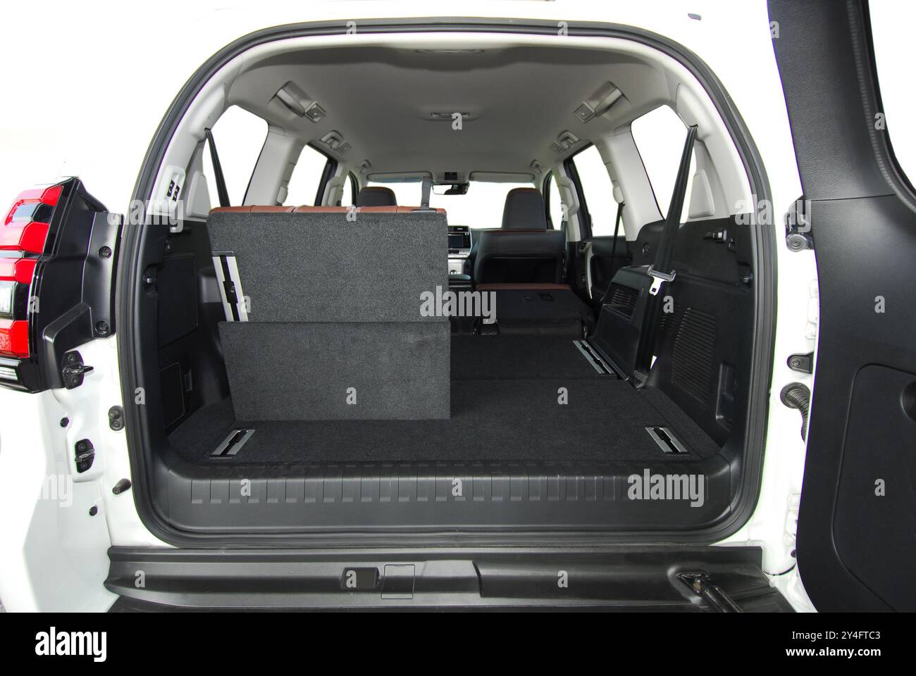 Car trunk with rear seats folded Stock Photo - Alamy