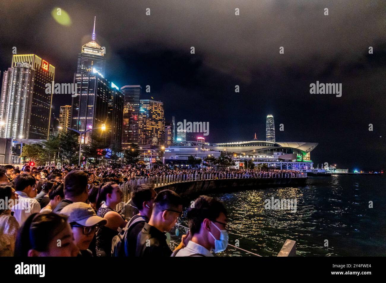 Wan Chai, Hong Kong. 17th Sep, 2024. Spectators crowd along the ...