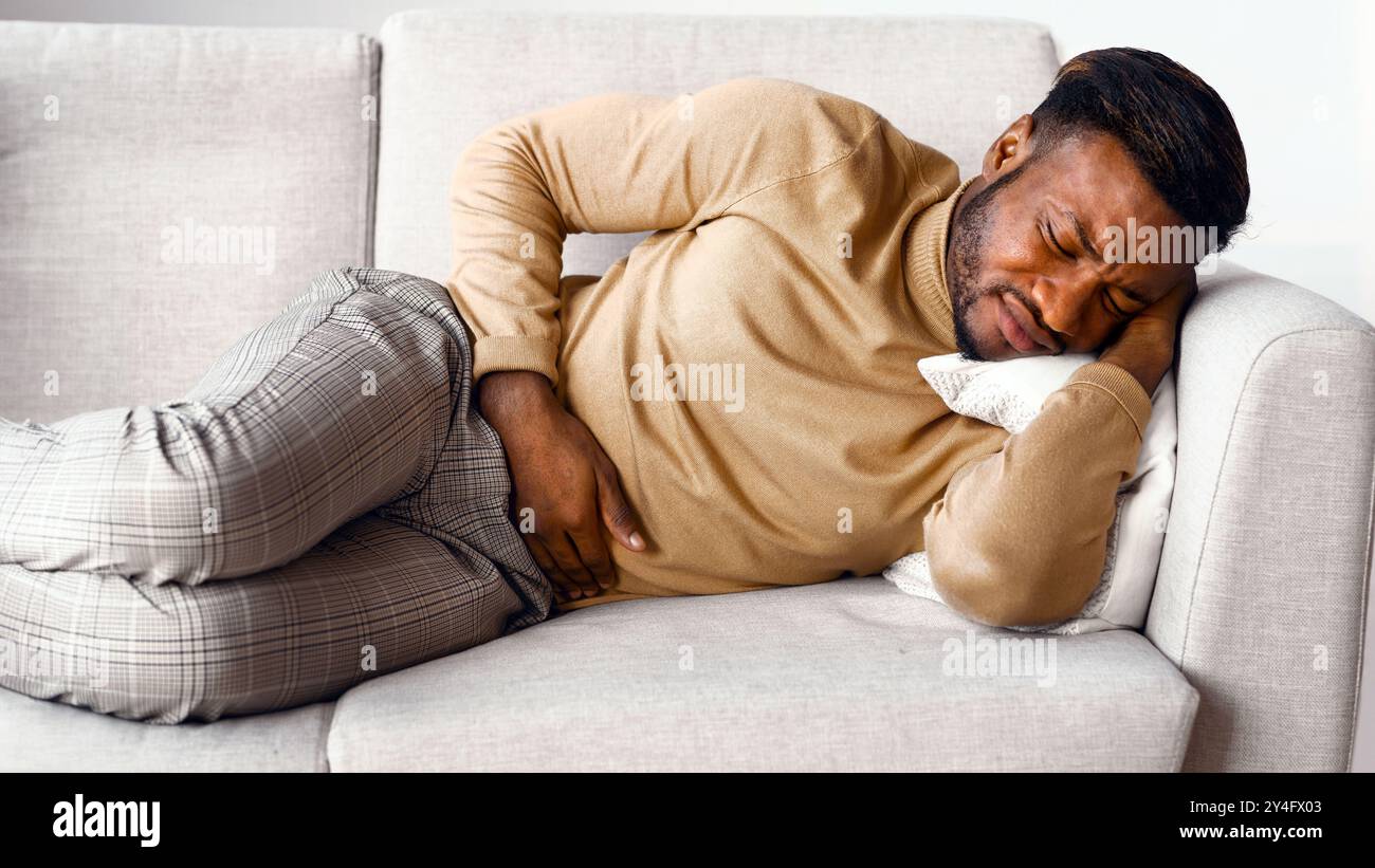 Businessman lying on stomach hi-res stock photography and images - Alamy