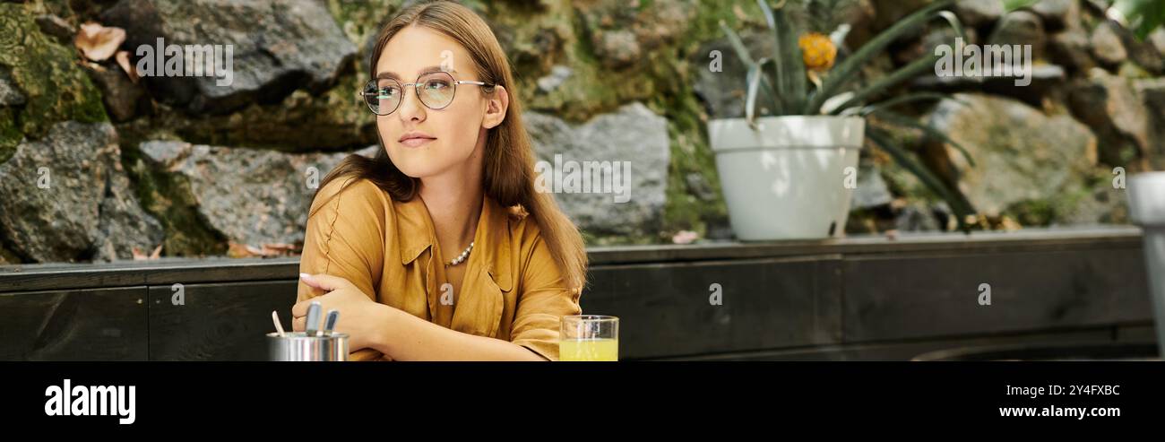 In a vibrant cafe, a young woman with a prosthetic leg relaxes ...