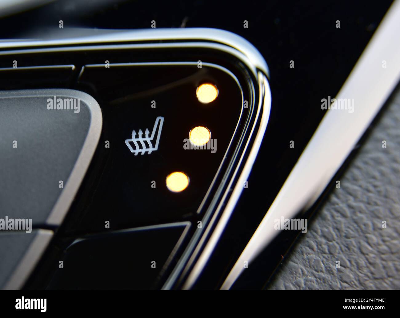 Car seat heater activation switch Stock Photo - Alamy