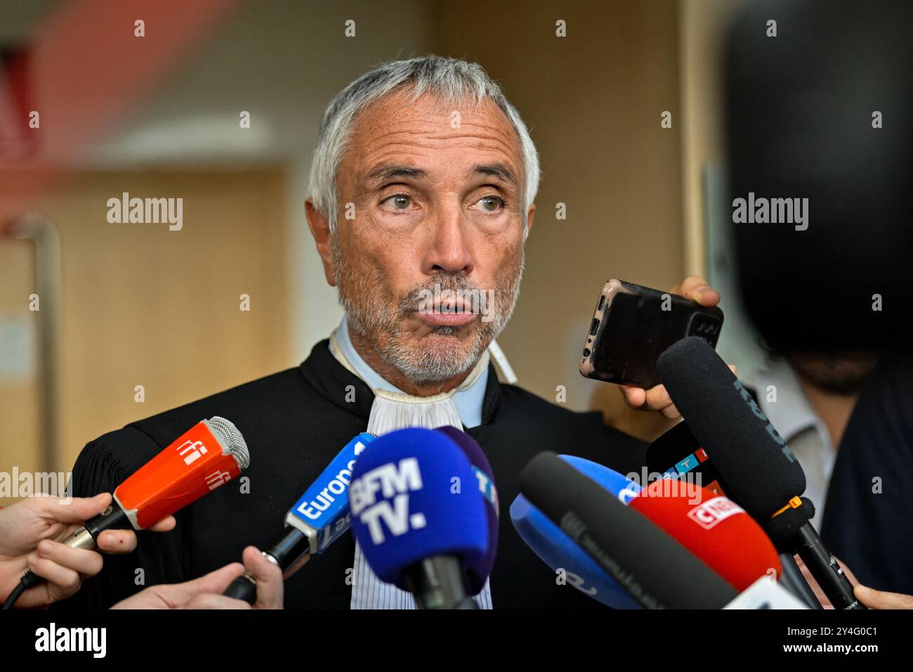 Jean-Pierre Marechal's lawyer Patrick Gontard speaks to the press as he ...