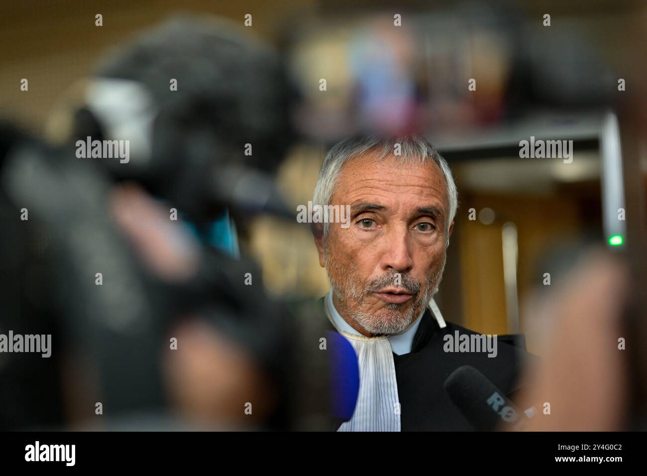 Jean-Pierre Marechal's lawyer Patrick Gontard speaks to the press as he ...