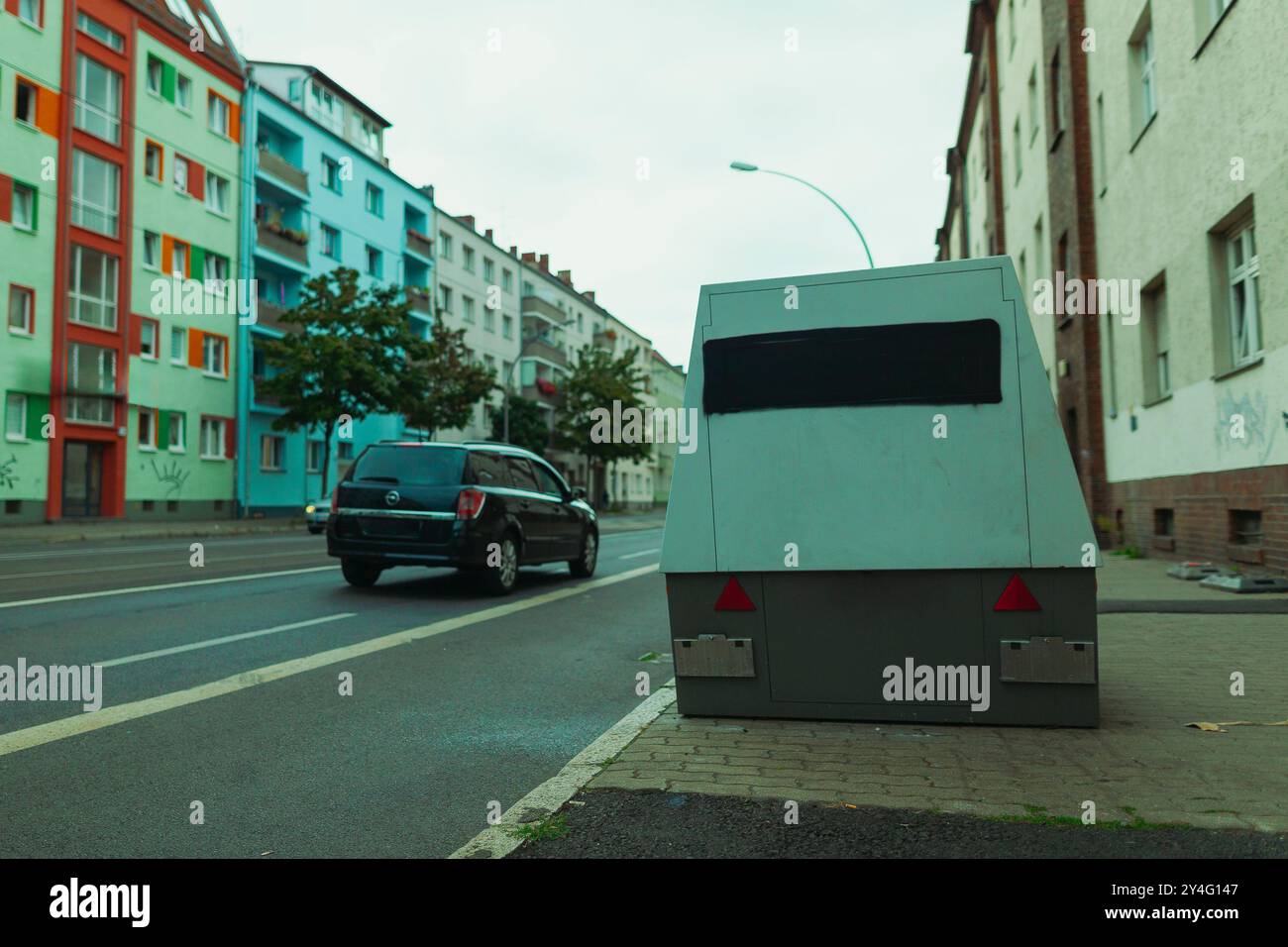 A mobile speed measuring device parked on the sidewalk, radar control ...