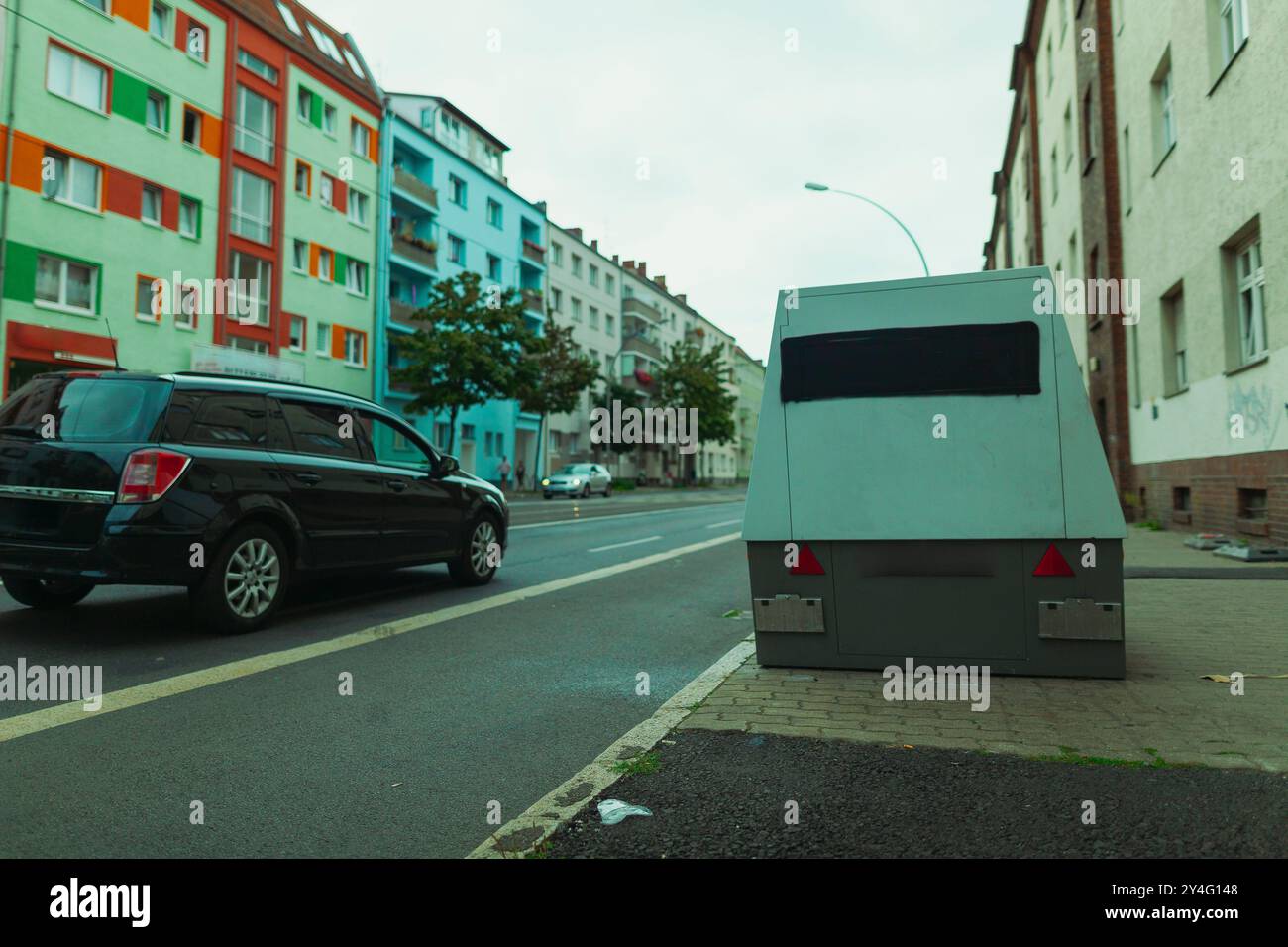 A mobile speed measuring device parked on the sidewalk, radar control ...