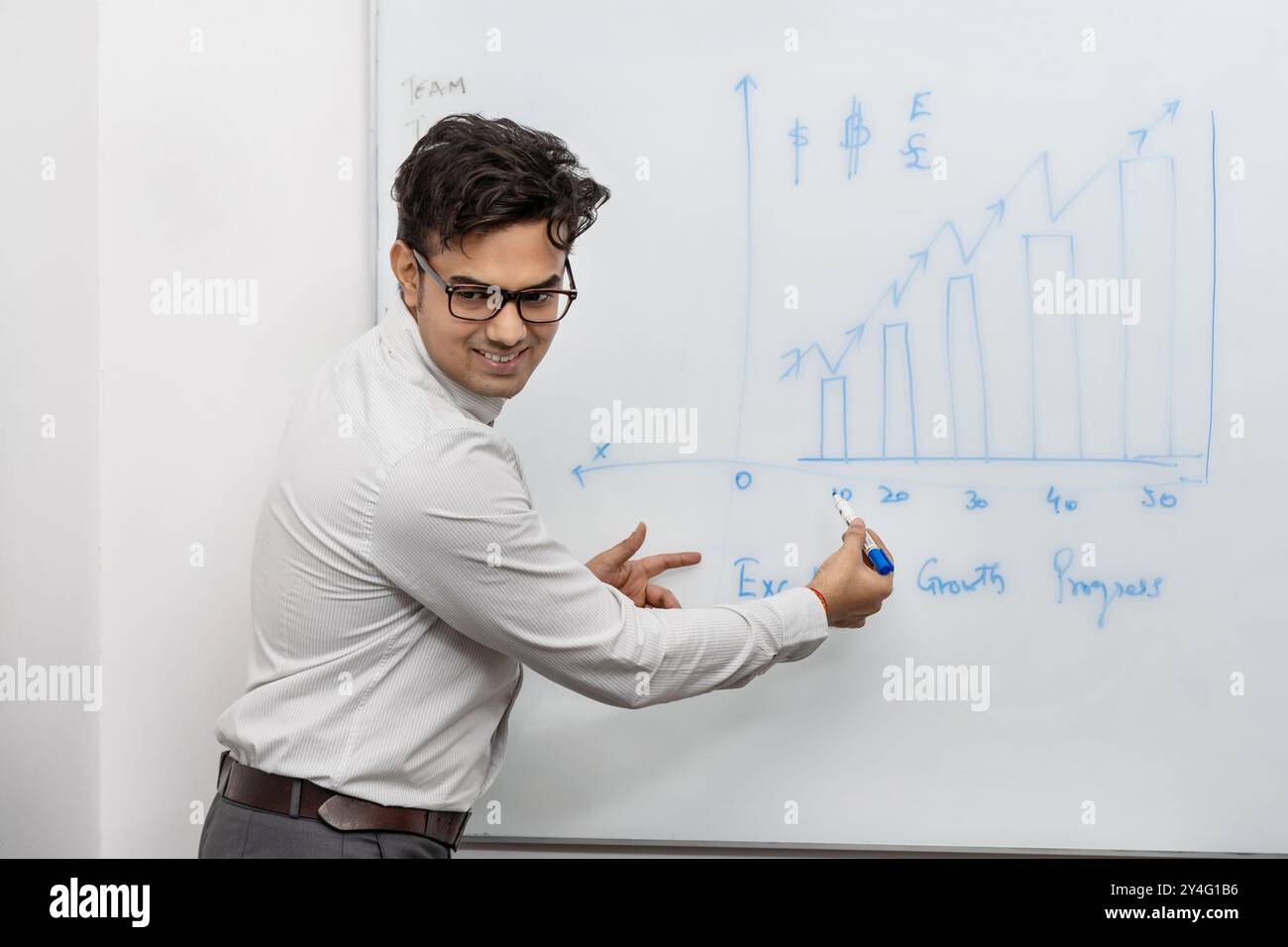 stock photo captures a serious businessman team leader delivering a ...
