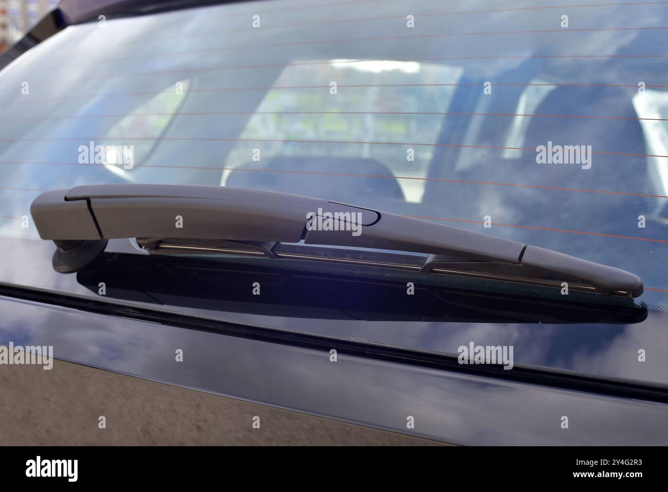 Wiper on the back windshield of a passenger car Stock Photo - Alamy