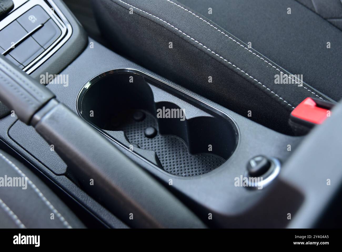 Cup holder on the console in the car. Part of the car's interior Stock ...