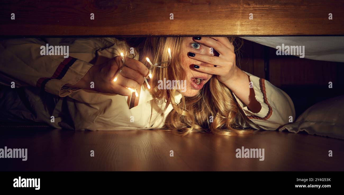 Woman searching under bed hi-res stock photography and images - Alamy