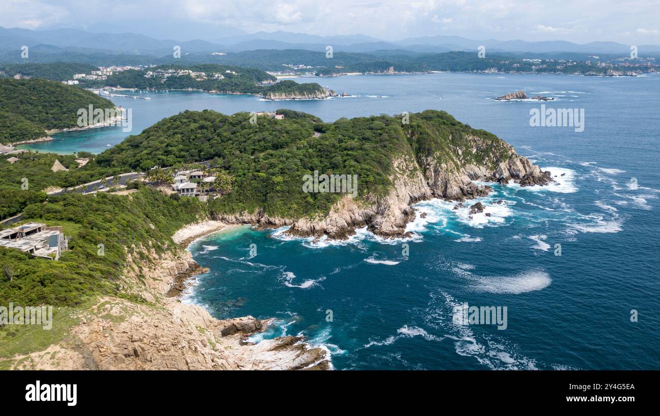 Aerial view of Santa Cruz Huatulco Bay on a sunny day in Oaxaca, Mexico ...