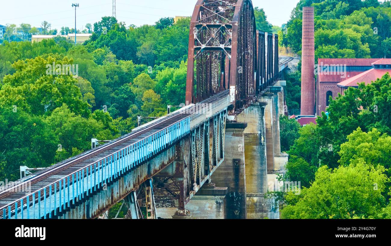 Aerial View of Rusted Railway Bridge Over Lush Landscape in Nashville ...
