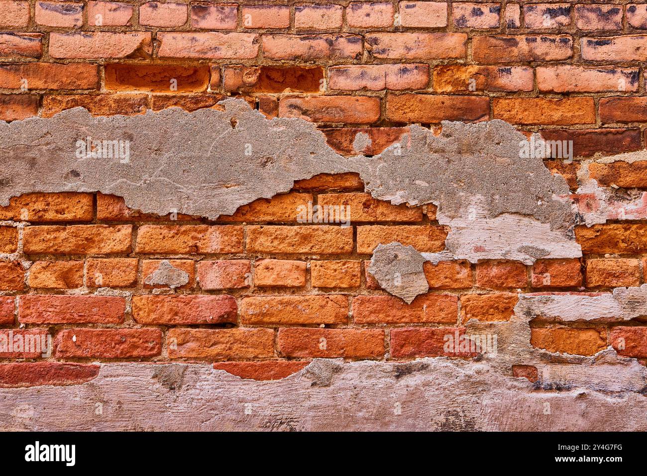 Weathered Brick and Peeling Plaster Texture Close-Up Stock Photo - Alamy