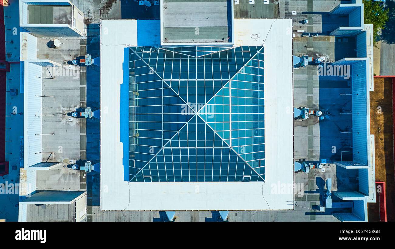 Aerial View of Modern Glass Atrium and Rooftops in Urban Setting Stock ...