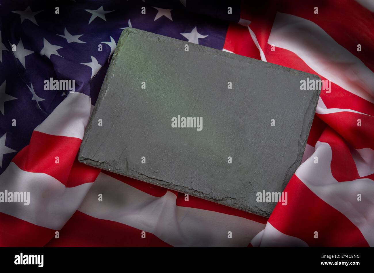 US American flag on black slate stone background. USA Memorial, Veteran ...