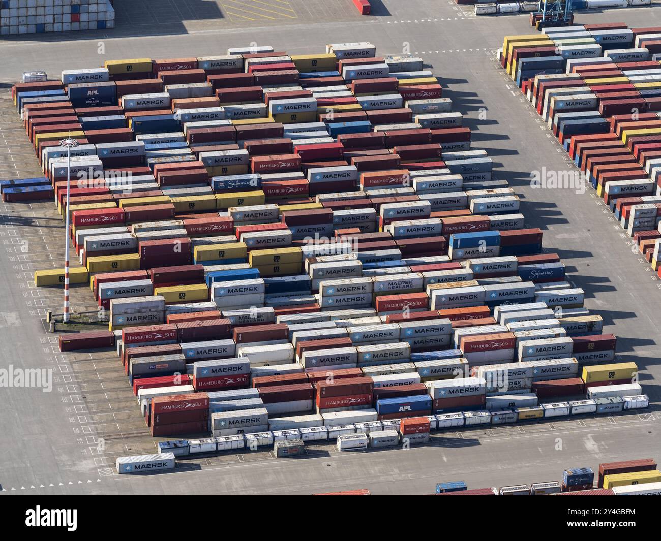 Hundreds of colorful containers are lined up in Rotterdam's Maasvlakte ...