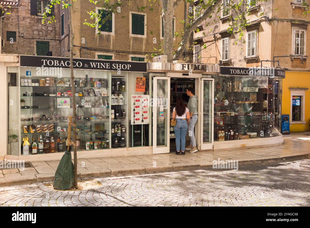 Wine store (off licence) and tobacco / tobacconist retailer retail shop ...