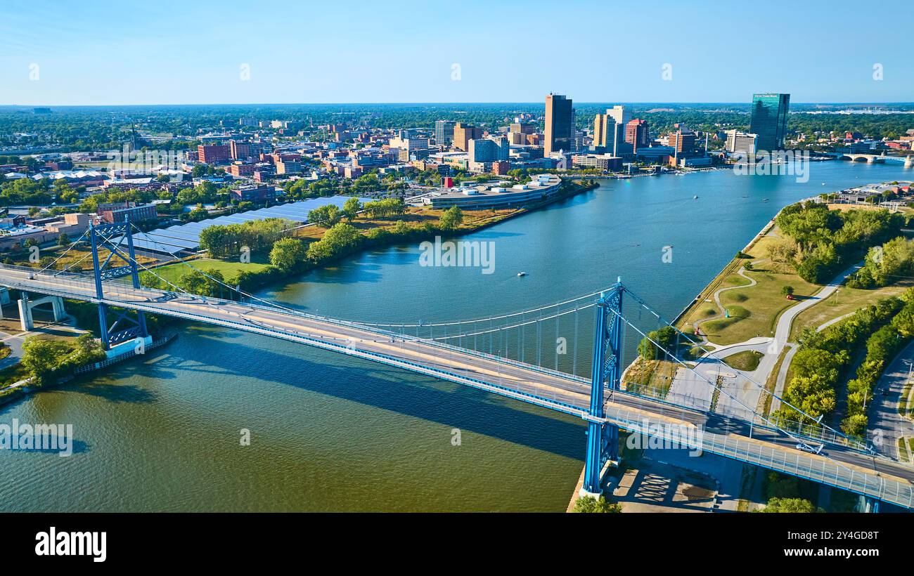 Aerial View of Blue Suspension Bridge and Toledo Skyline Over Maumee ...