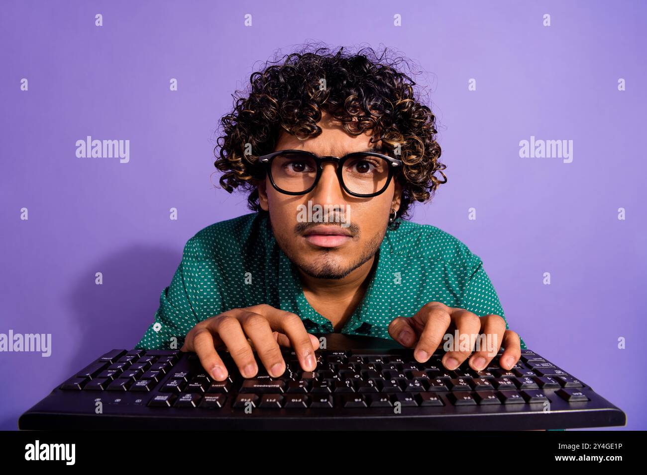 Closeup photo of arabian guy working programmer addicted looking in pc ...