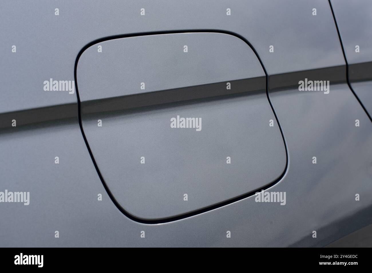 Gas tank metal cover on a passenger car Stock Photo - Alamy