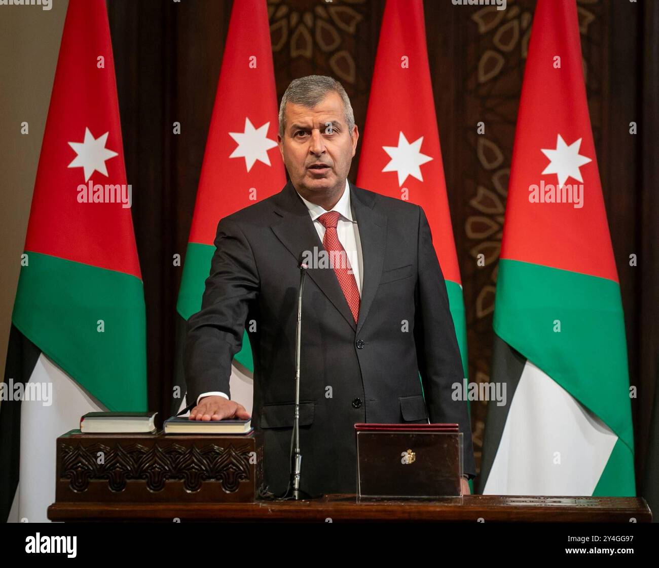 The prime minister and ministers of the new Jordanian government take ...
