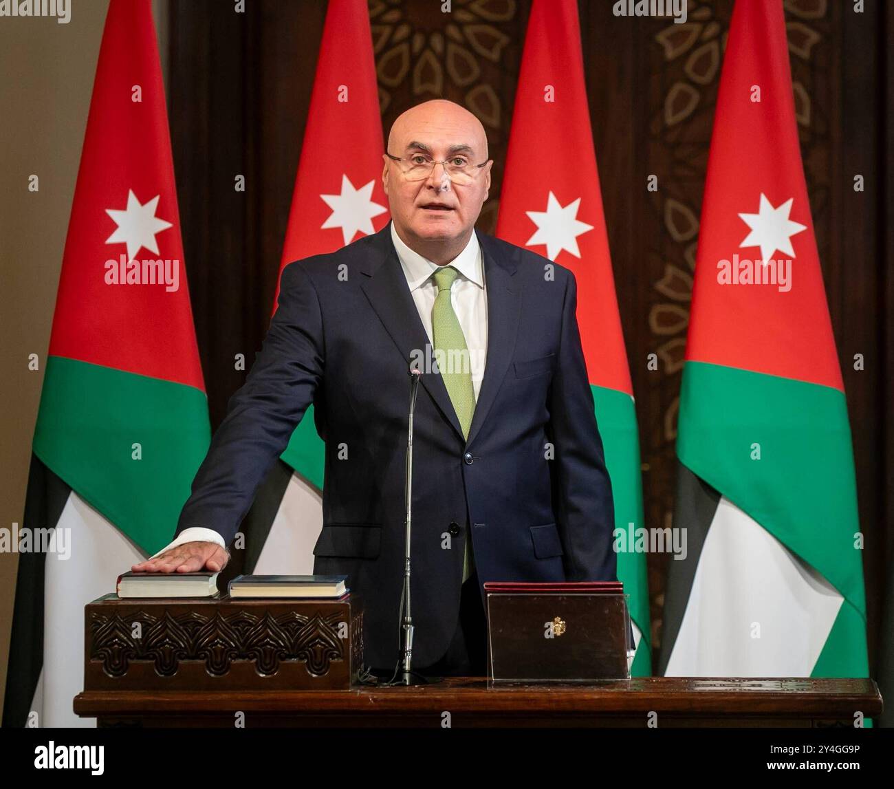 The prime minister and ministers of the new Jordanian government take ...