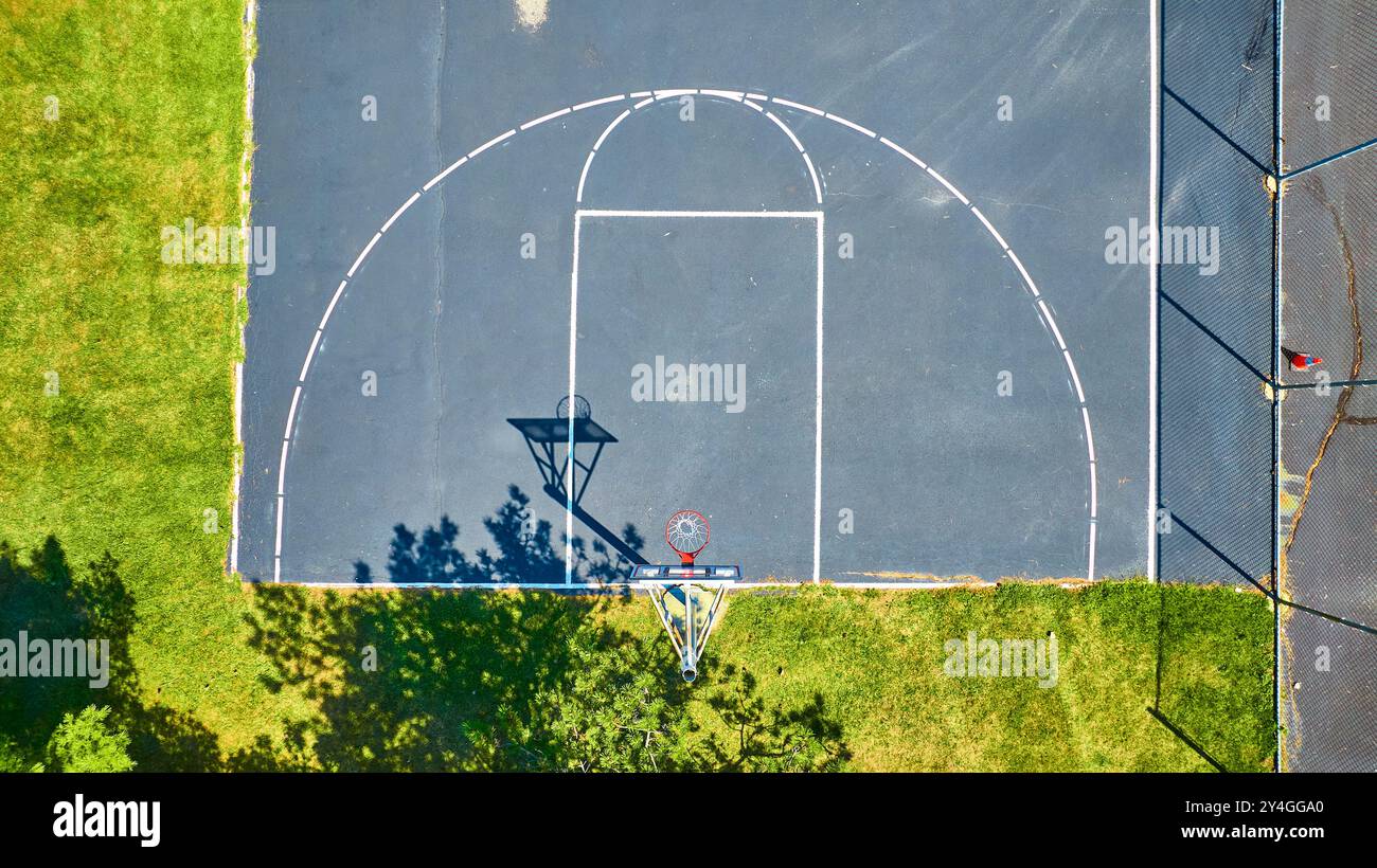 Aerial Top Down View of Outdoor Basketball Court with Shadowed Hoop ...