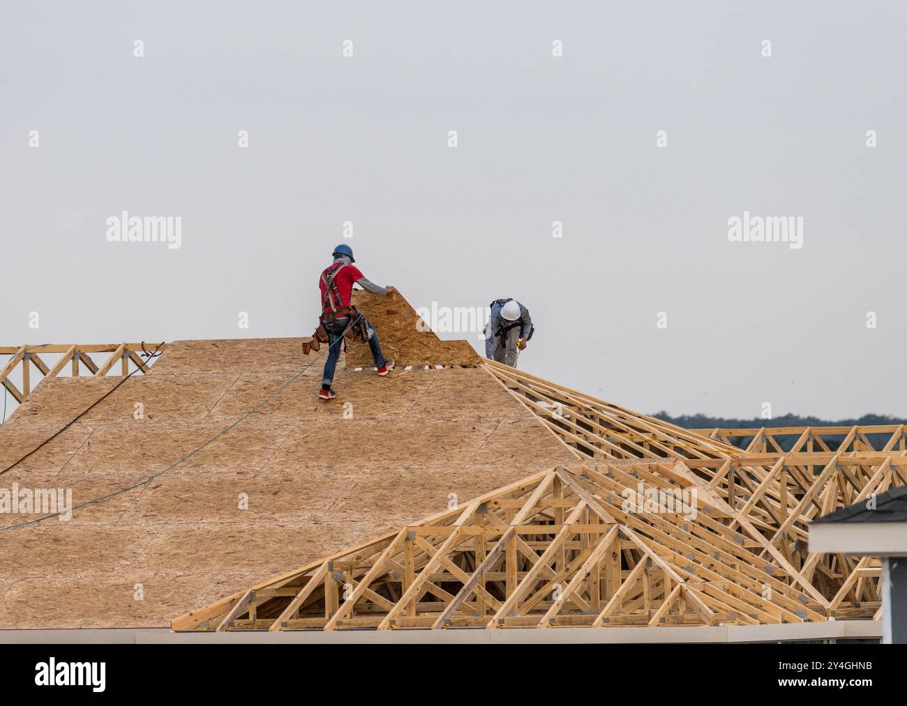 Single family home with slab foundations and dimensional lumber frames ...