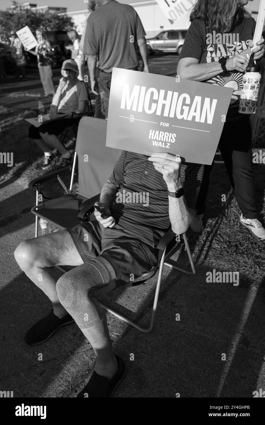 Kamala Harris supporter with a Michigan for Harris Walz sign at the ...