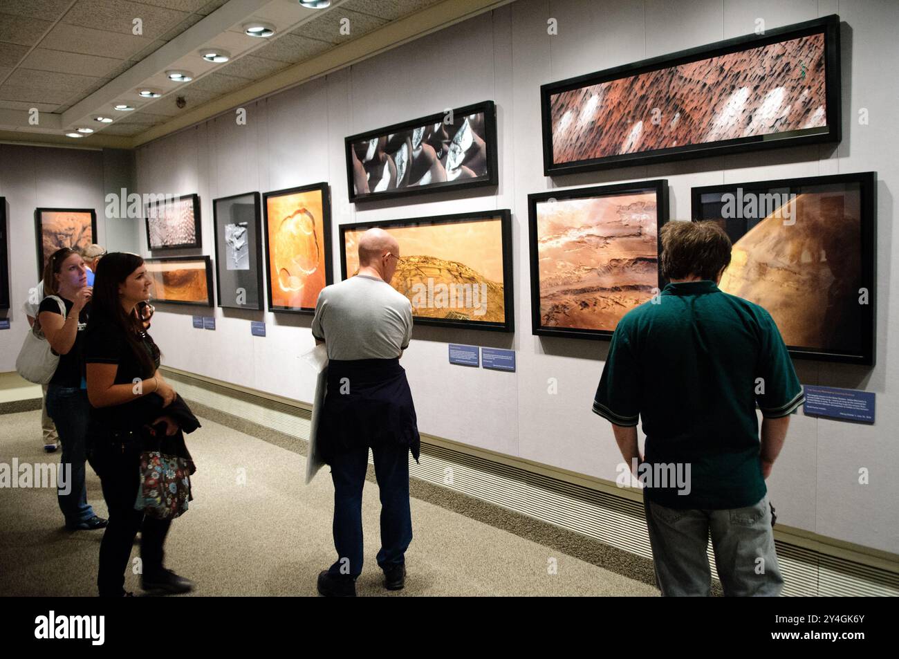 Visitors view Michael Benson's photographic images of Mars at the ...