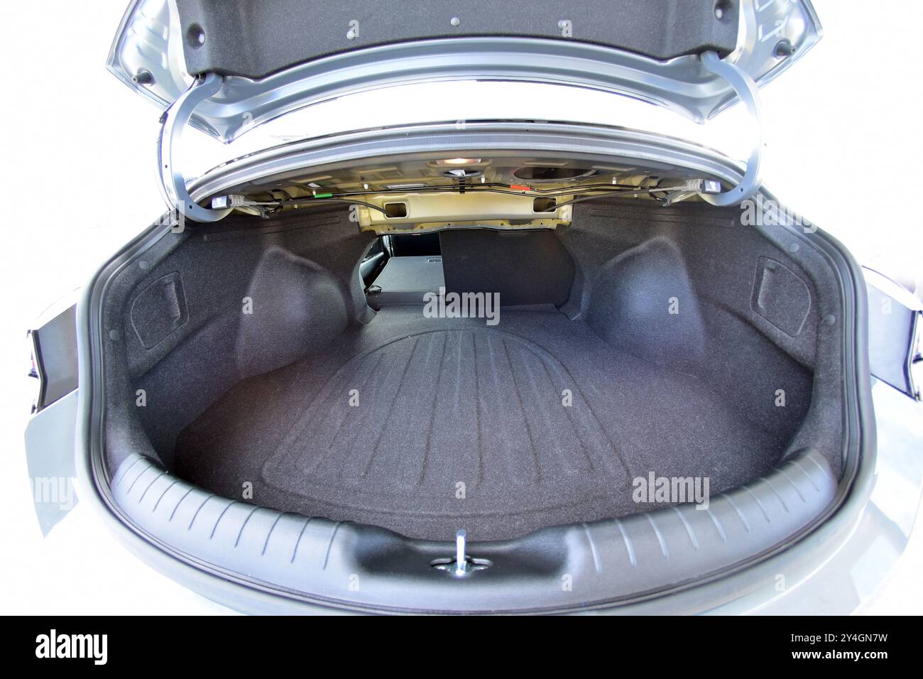 Empty Trunk in a sedan with lowered one backrest Stock Photo - Alamy
