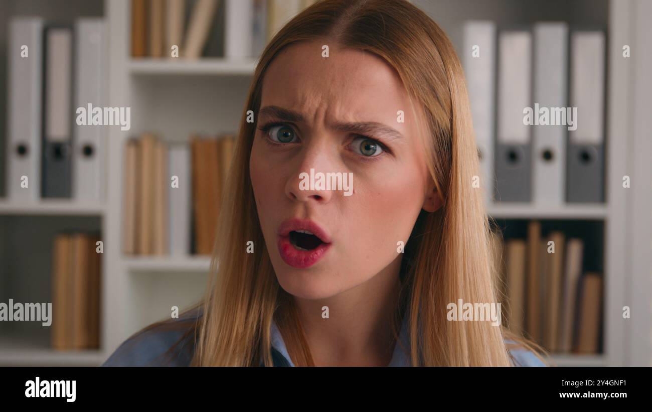 Shocked female face big eyes open mouth portrait amazed astonished stunned wonder astonish ...