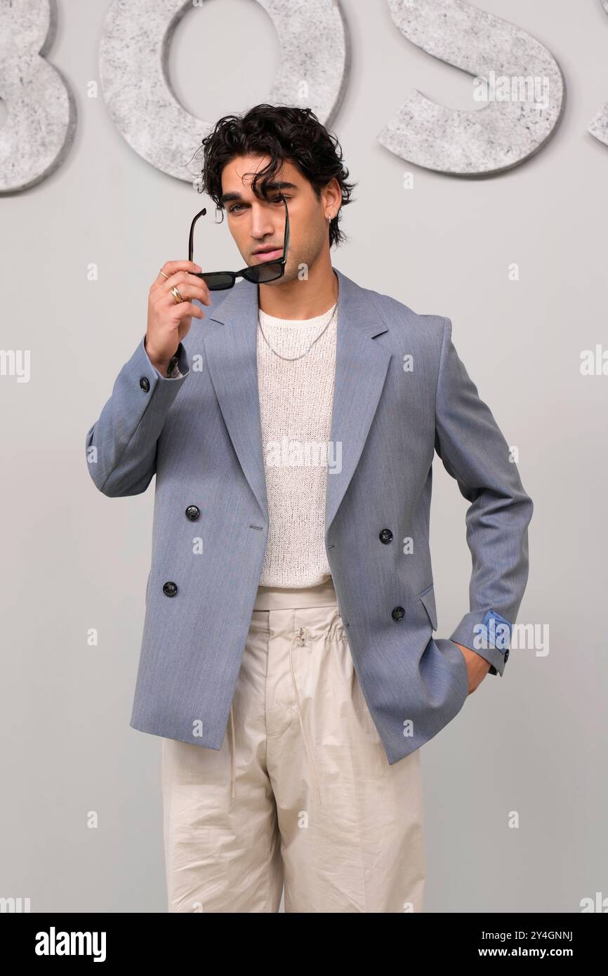 Josh Heuston arrives for the Boss Spring Summer 2025 fashion show, that ...