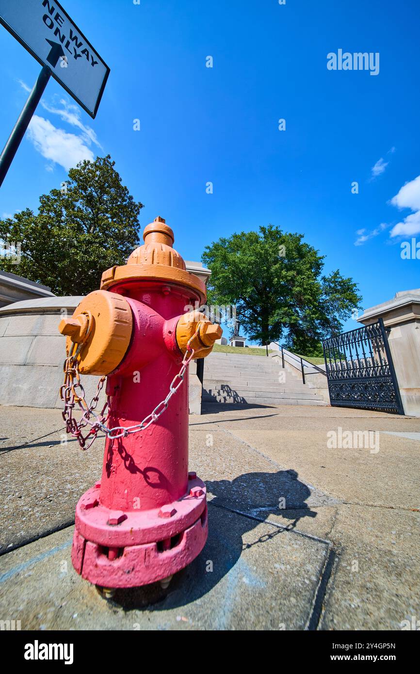 Vibrant Fire Hydrant with One Way Sign and Stone Steps Low Angle View ...