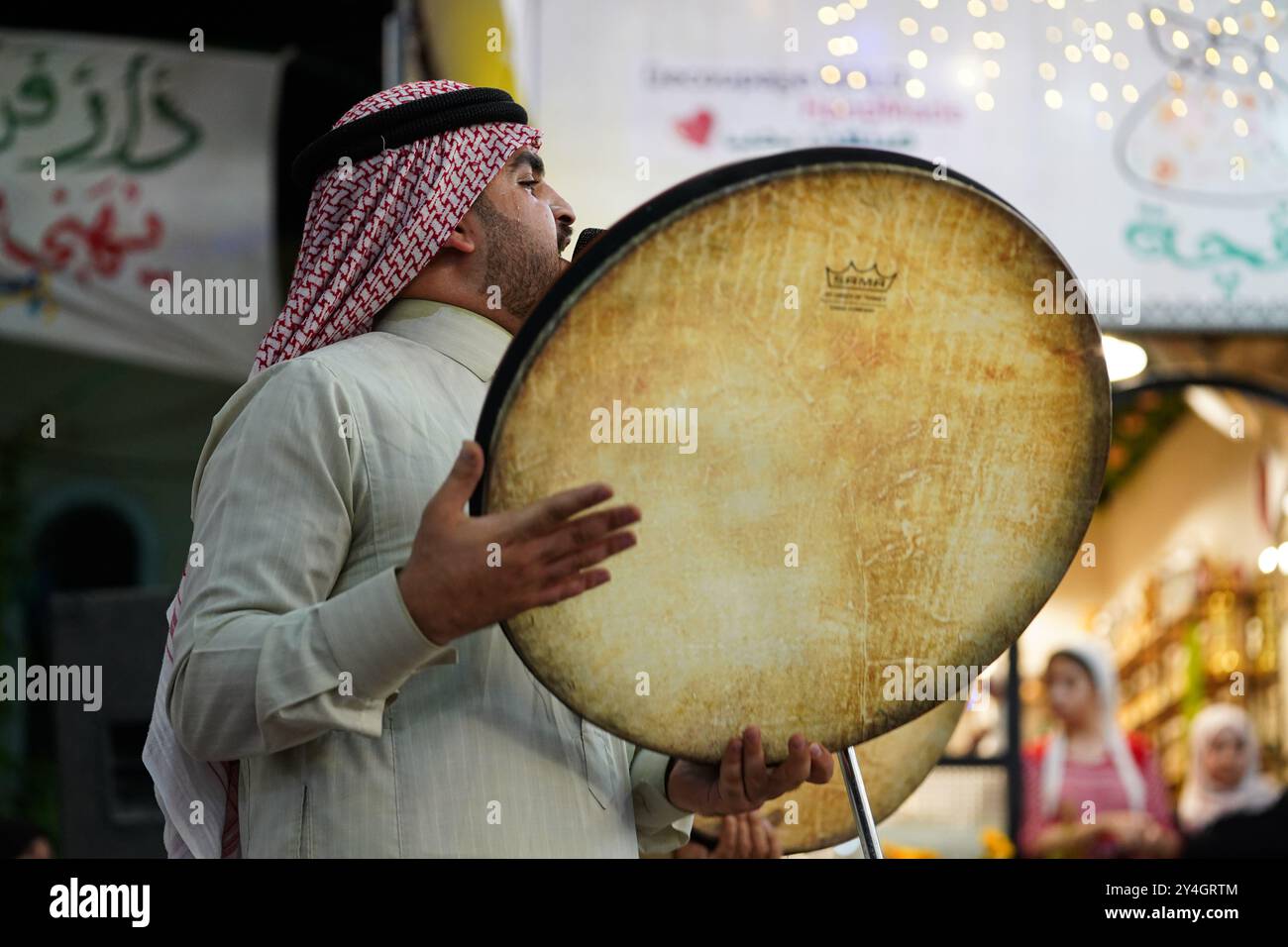 A muslim man seen performing with the traditional Daf during a ...