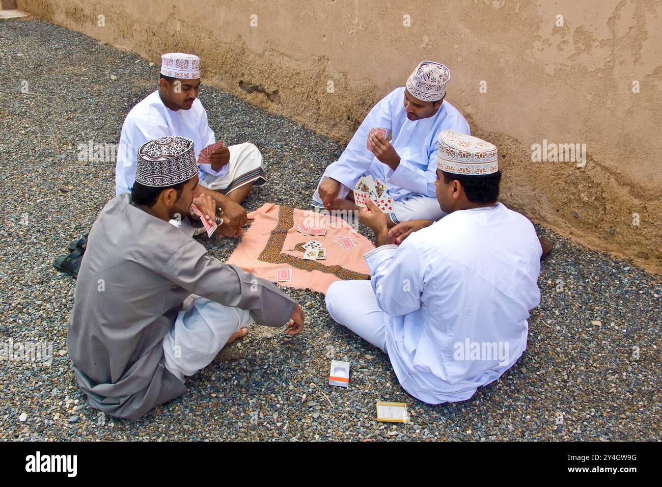 Men playing cards, Jabrin, Sultanate of Oman Stock Photo - Alamy