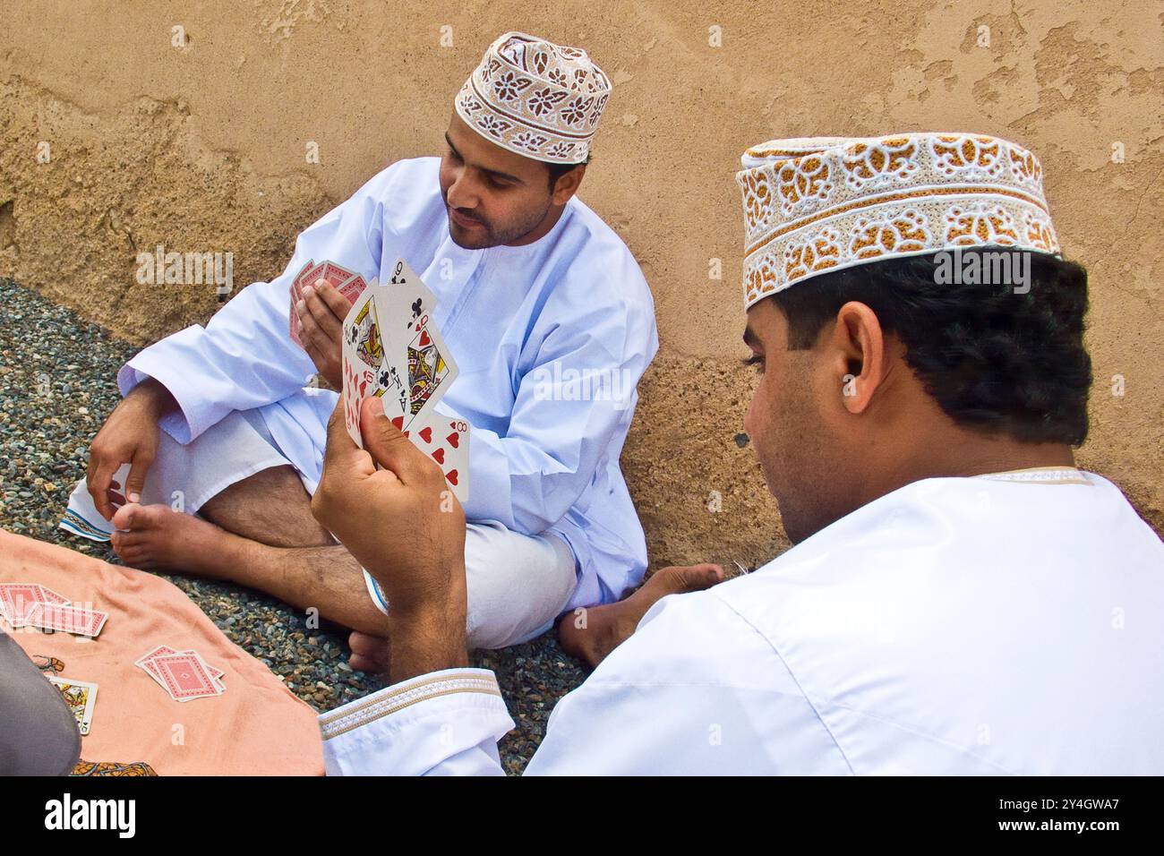 Men playing cards, Jabrin, Sultanate of Oman Stock Photo - Alamy