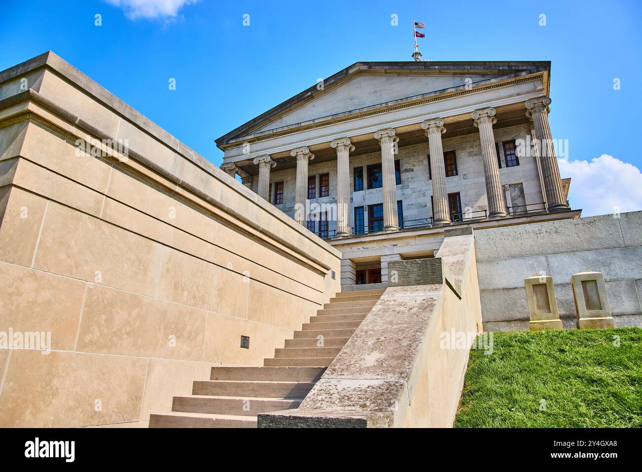 Tennessee State Capitol with American Flag and Columns Upward View ...