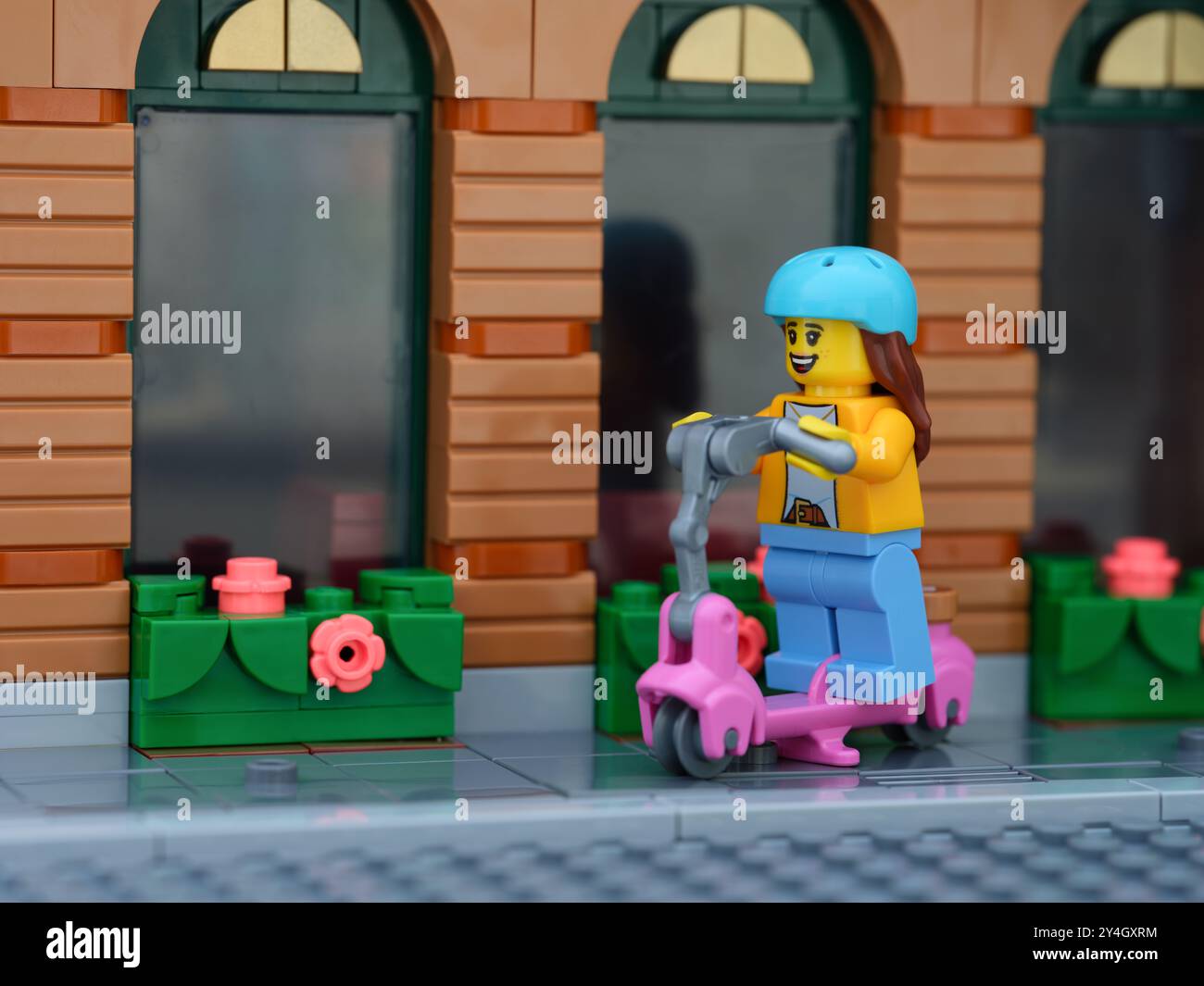 Tambov, Russian Federation - June 30, 2024 Lego girl minifigure riding ...