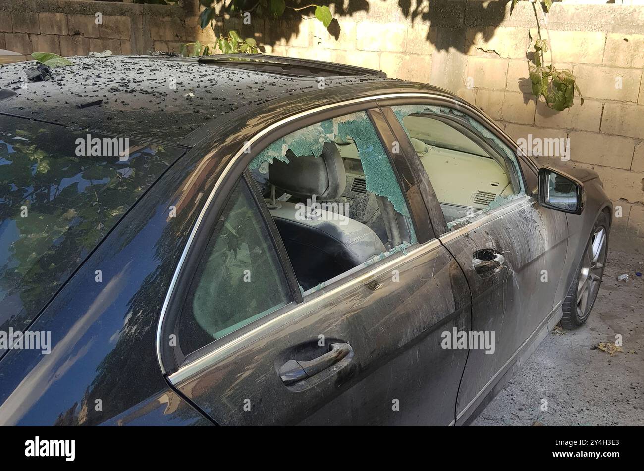 A partly damaged car after what is believed to be the result of a ...
