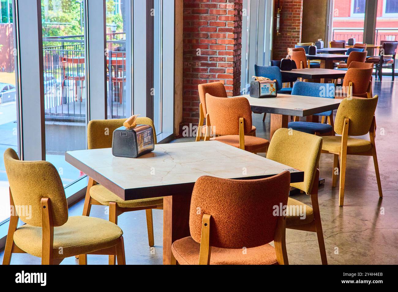 Modern Cafe Interior with Vibrant Seating in Urban Setting Eye-Level ...