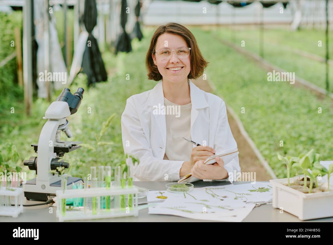 Conducting Botanical Research in Laboratory Greenhouse Stock Photo - Alamy