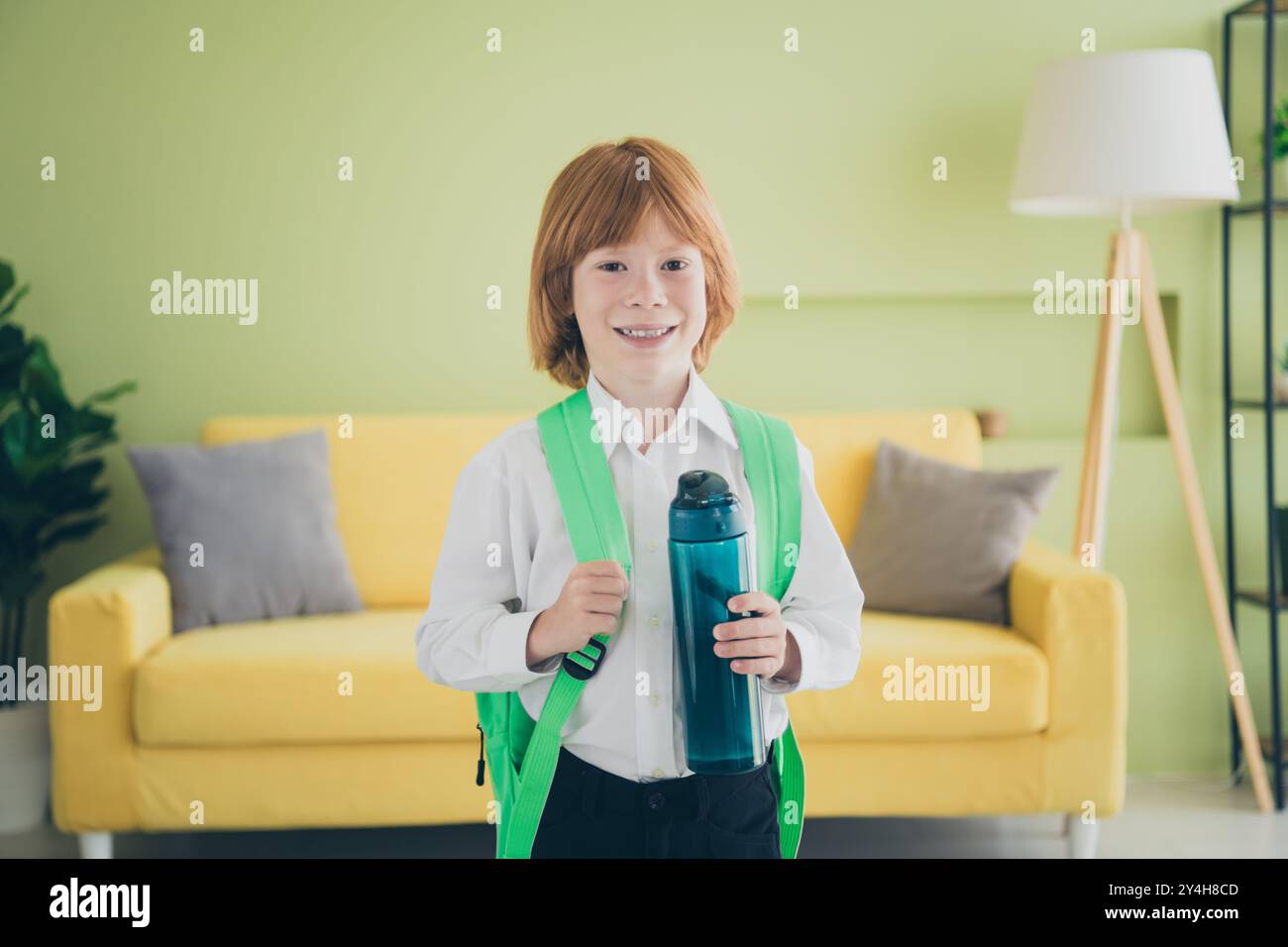 Portrait of cute charming adorable little boy learner schoolkid wearing ...