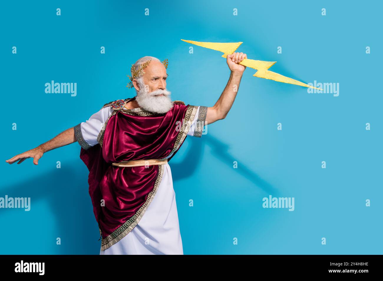 Photo of powerful mature man strike lightning wear ancient roman ...