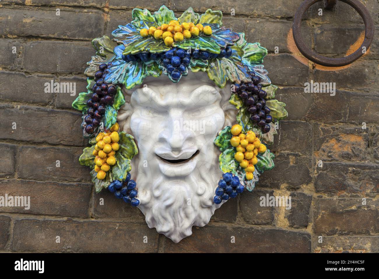 Colourful porcelain head, sculpture, representation, prosperity, wine ...