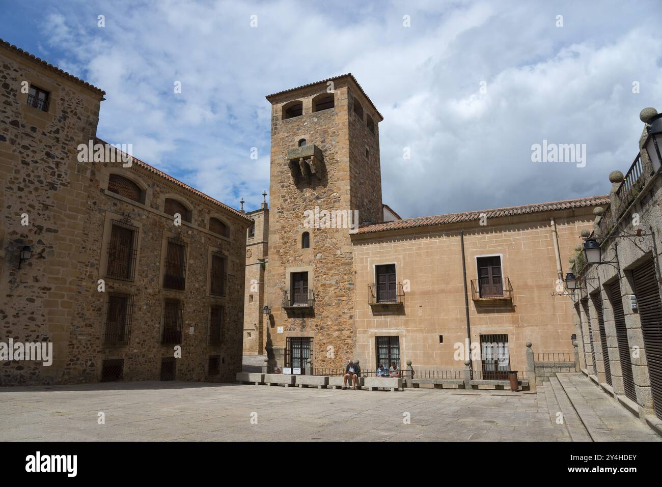A quiet square with old stone buildings and a tower, palace, Palacio de ...