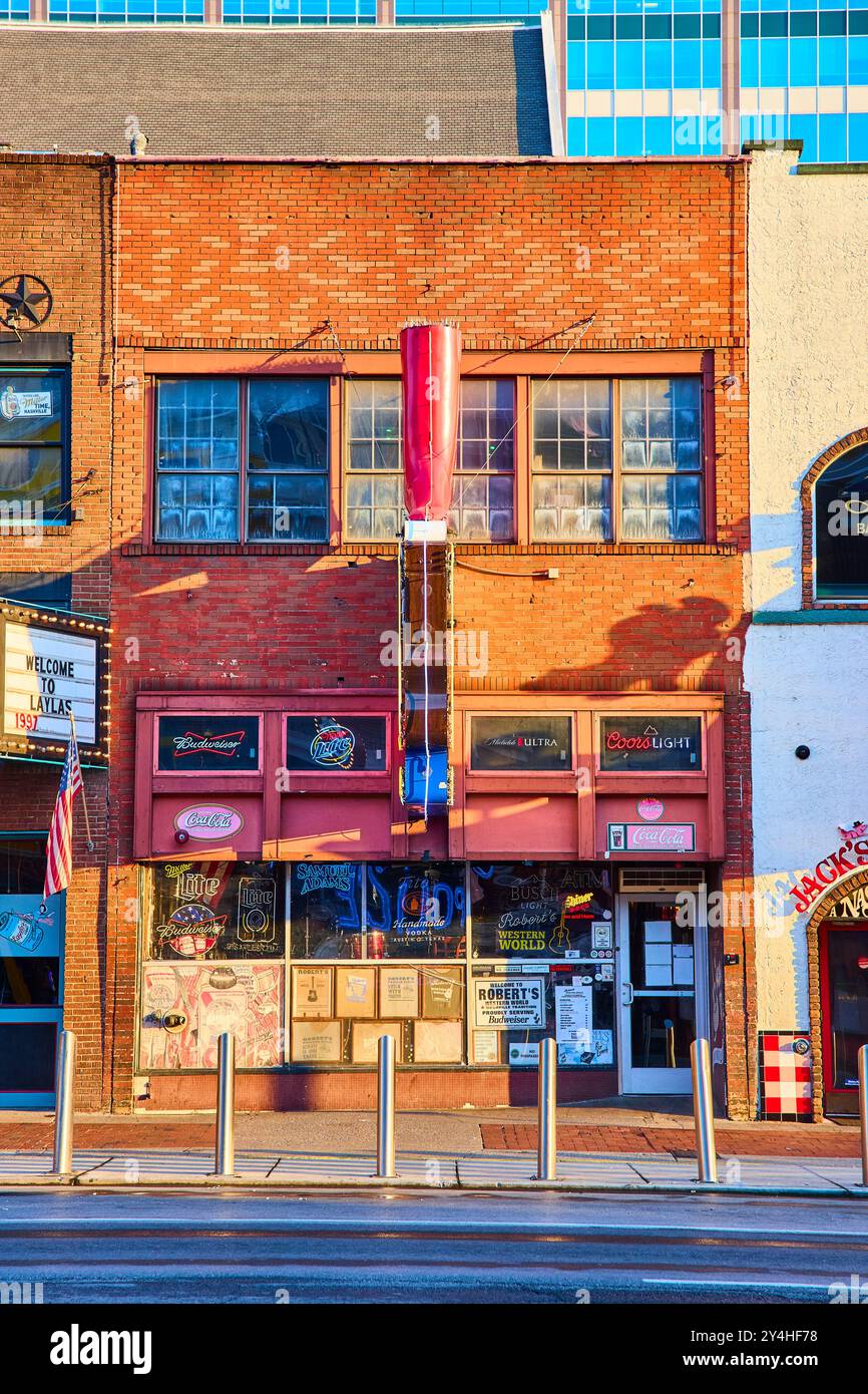 Urban Bar Facade with Guitar Sign on Broadway Street Eye-Level View ...