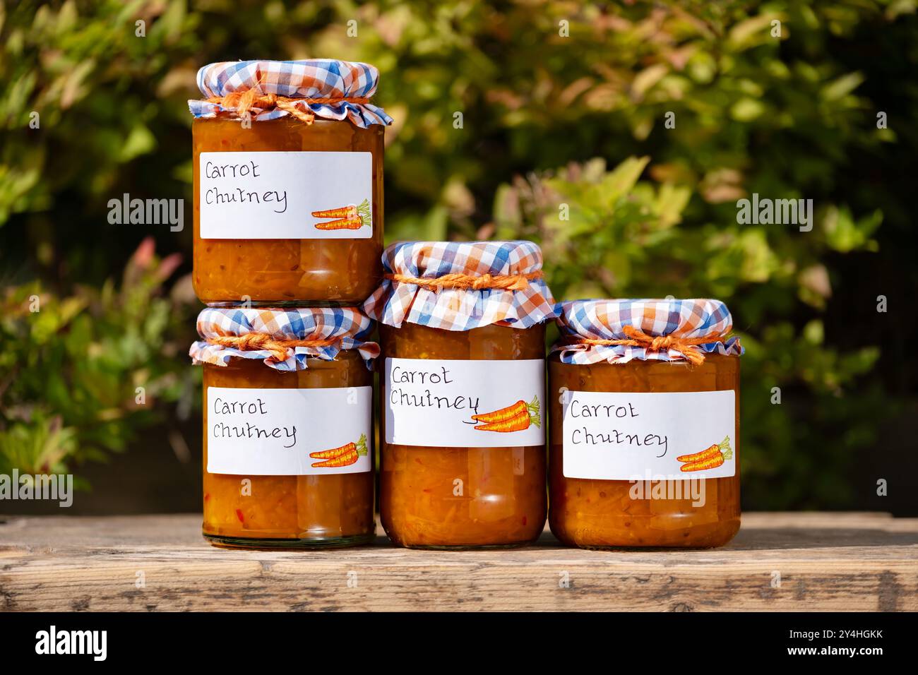 Uk. Homemade Carrot chutney stored in glass jars, labelled and finished ...